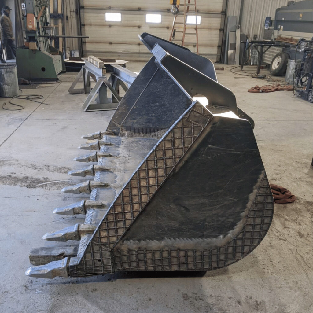 Hard Surfacing Loader Bucket » Hranco Industries Ltd.